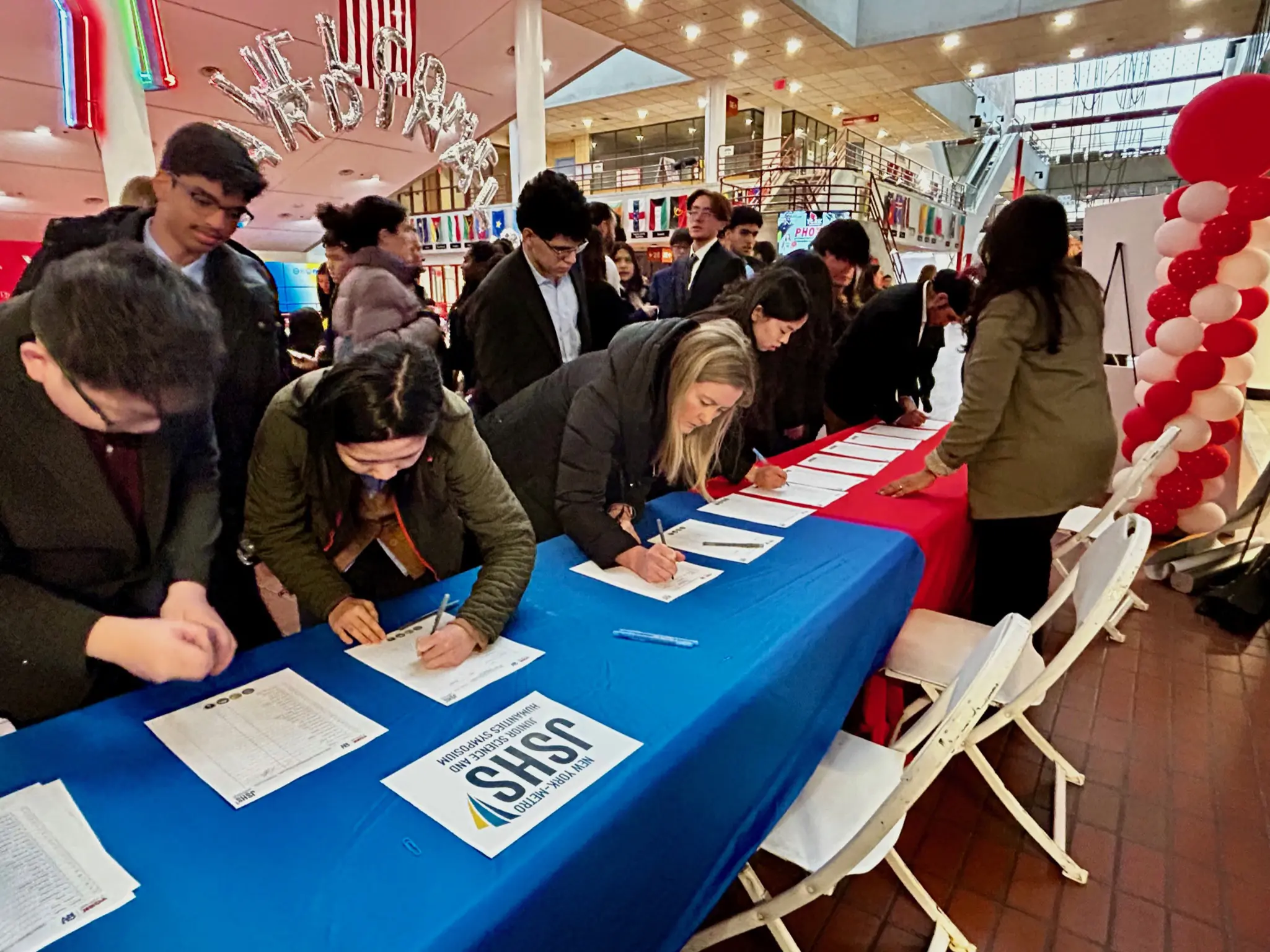 Students Signing Up at JSHS Event - Junior Science and Humanities ...